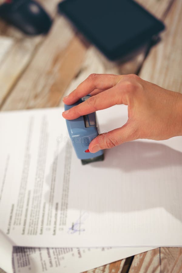 Female Hand Stamping Document Stock Image - Image of agent, female ...