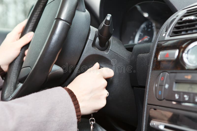 Female Hand Starting a Car Engine Stock Image - Image of indoors, hands ...