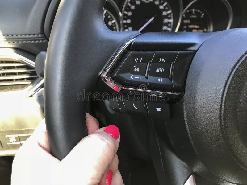 Female Hand on the Steering Wheel Inside the Car. Stock Image - Image ...