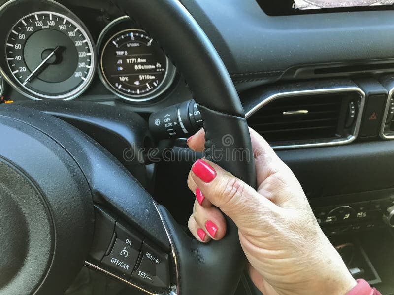 Female Hand on the Steering Wheel Inside the Car. Stock Image - Image ...