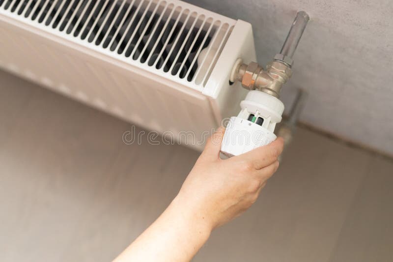 Female Hand Switches the Heating Radiator Stock Image - Image of ...