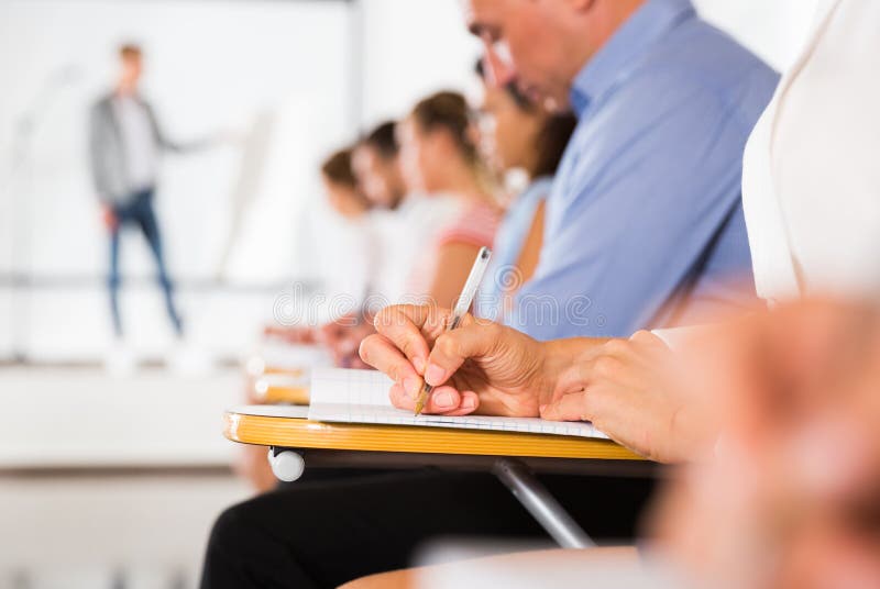 Female hand taking notes stock photo. Image of person - 156917388