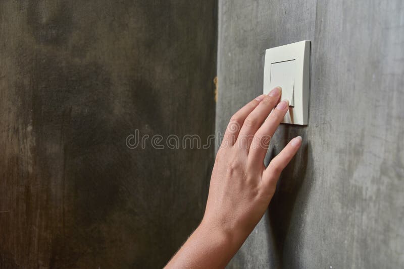 Female Hand, To Turn Off the Light, Switch, Front View Stock Photo ...
