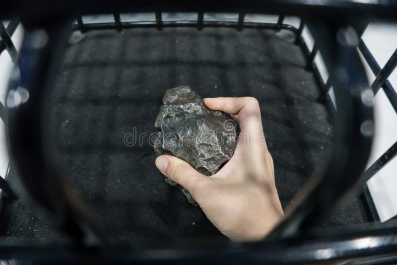 Female Hand is Touching a Meteorite in the Museum Editorial Photography ...