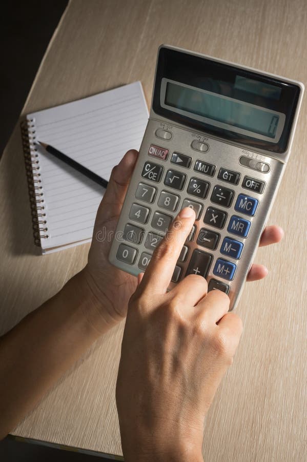 Female Hand Using Calculator. Stock Photo - Image of hand, desk: 66093542