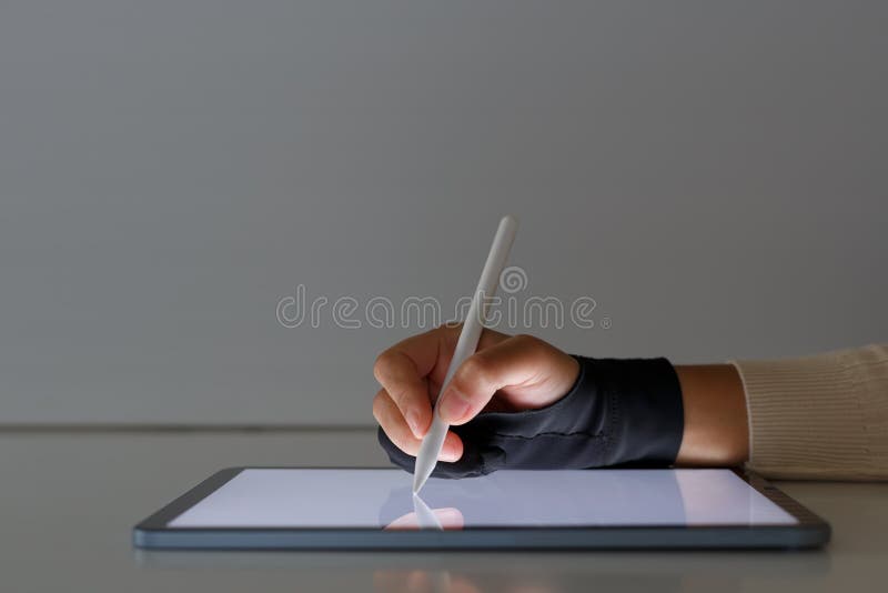 Female Hand Using Pen To Draw Design on Tablet Screen with Wrist ...