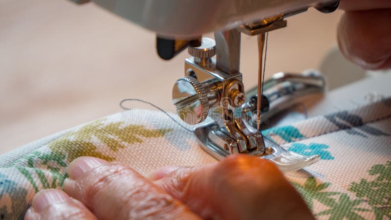 Female Hand Using Sewing Machine Stitching Fabic Stock Image - Image of ...