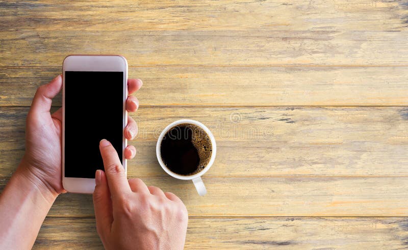 Female Hand Using Smartphone White Screen and Cup of Coffee on W Stock ... Female Hand Using Smartphone White Screen and Cup of Coffee on W Stock ...