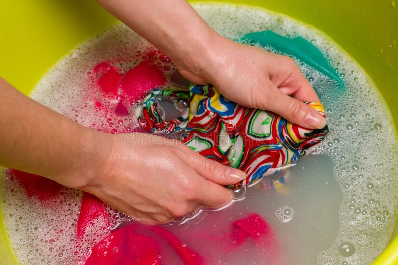 Female hand wash clothes. stock photo. Image of laundry - 51780652