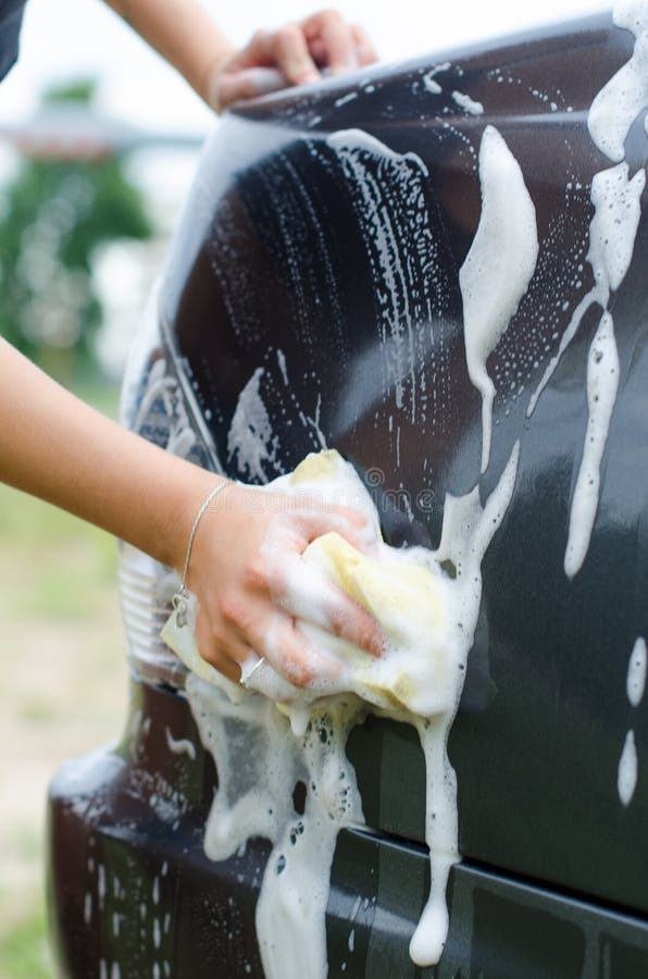 Female hand washing car. stock image. Image of grime - 43432297