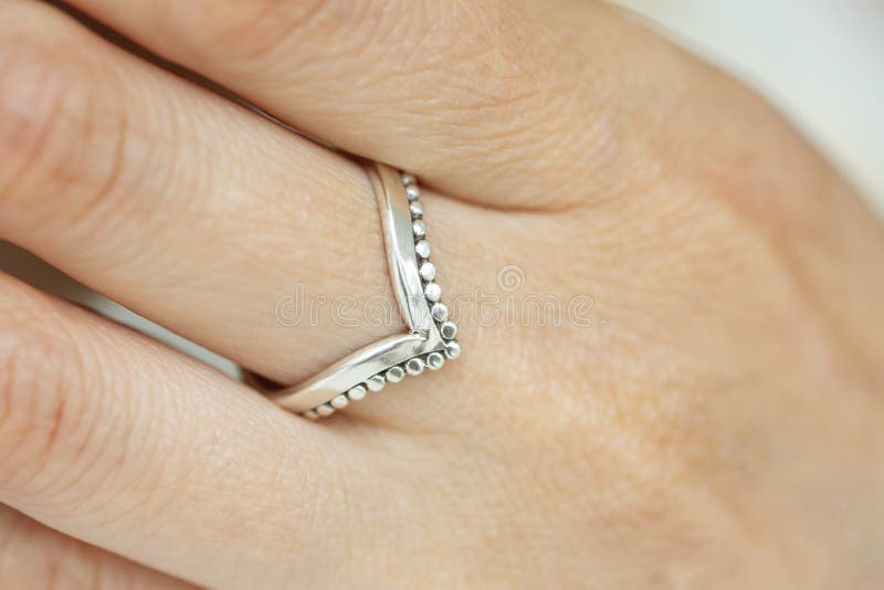 Female Hand Wearing Silver Ring Stock Image - Image of skin, product ...