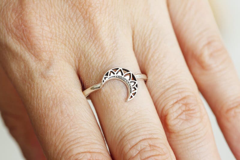 Female Hand Wearing Silver Ring Stock Image - Image of wear, plated ...