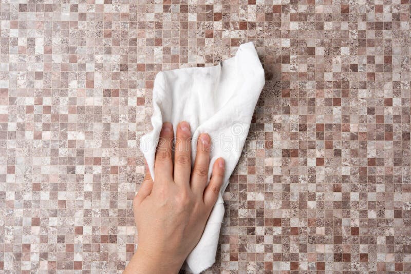 Female Hand Wipes a Brown Table with a White Rag Stock Image - Image of ...