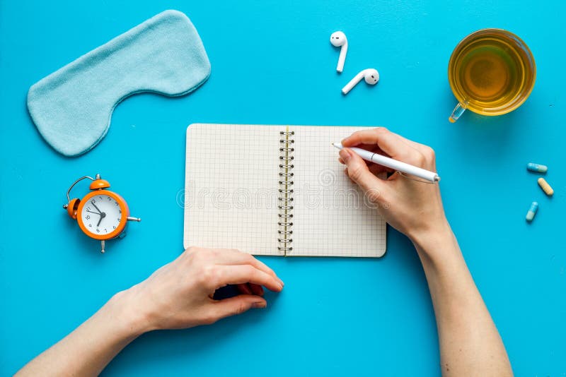 Female Hand Write in Notebook - Day Plan before Sleeping. Top View ...