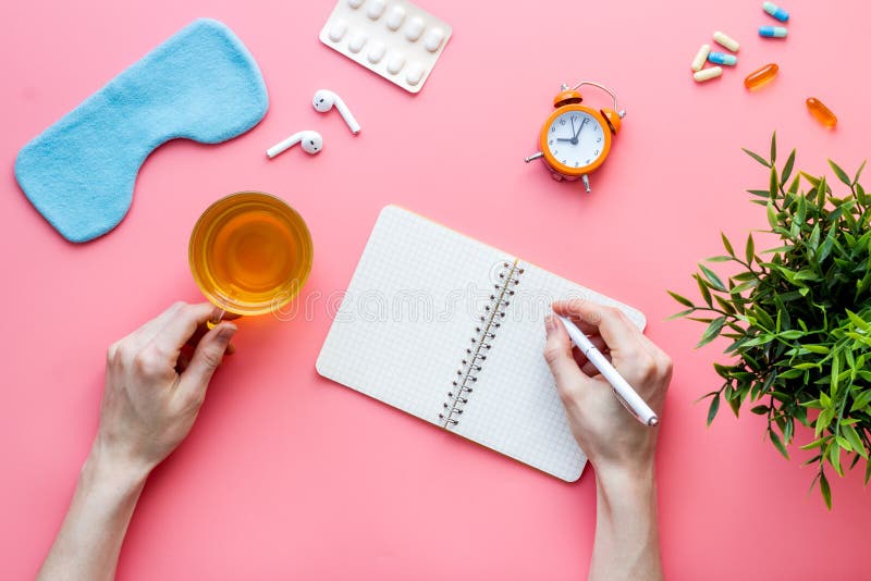 Female Hand Write in Notebook - Day Plan before Sleeping. Top View ...