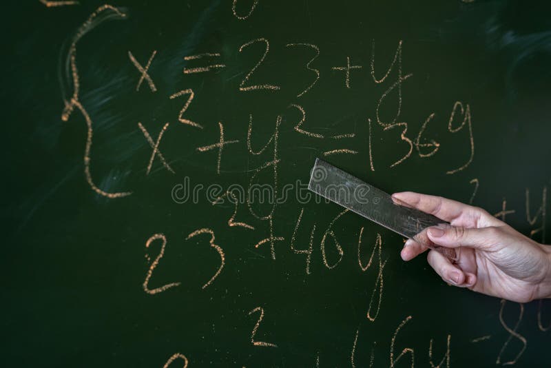 Female Hand Writing Math Formulas on the Classboard Stock Image - Image ...