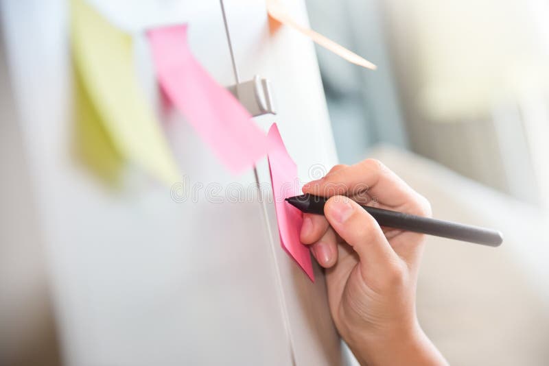 Female Hand Writing on Post it Notes. Stock Photo - Image of design ...