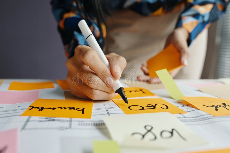 Female Hand Writing on Sticky Notes Stock Image - Image of office ...