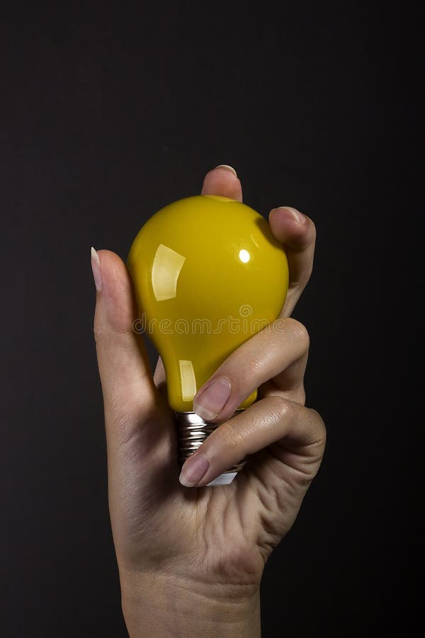 Hand with light bulb stock photo. Image of saving, conservation - 155691128