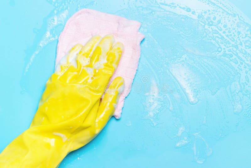 Female Hand in Yellow Rubber Gloves Wipe the Surface with Rag. Stock ...