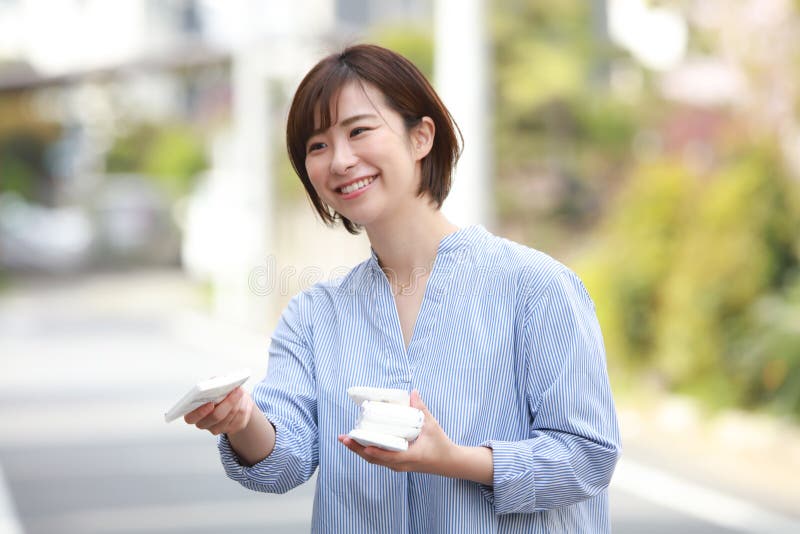 Female handing out tissue stock photo. Image of brown - 238946300