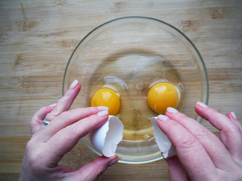 Female Hands Break an Egg, Cooking Egg Dishes Stock Image - Image of ...