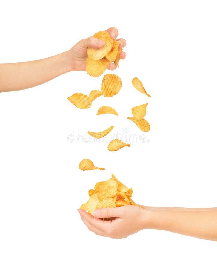 Female hands with chips stock image. Image of extended - 61262191