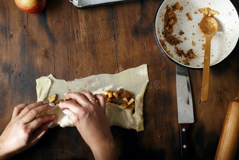 Female Hands Cooking Apple Strudel Top View Stock Photo - Image of ...