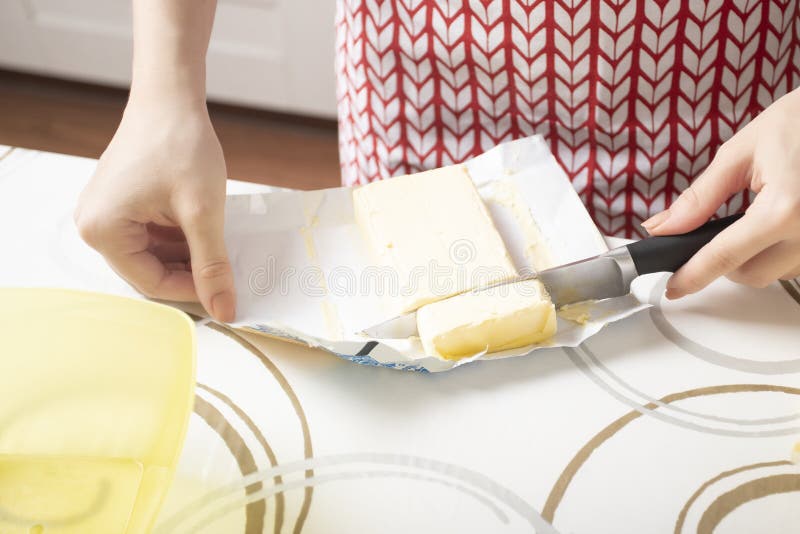 Female Hands Cut the Butter Stock Photo - Image of butter, cook: 206366556