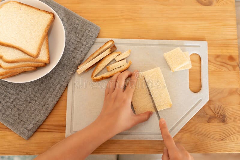 Female Hands Cutting Bread for Toast Stock Photo - Image of healthy ...