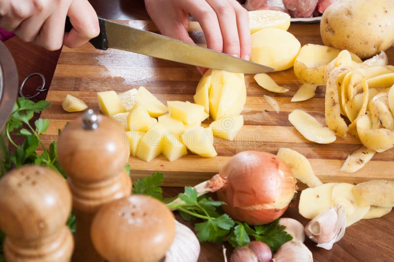 Female Hands Cutting Potatoes Stock Photo - Image of white, detail ...