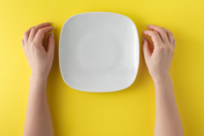 Female Hands Empty Plate Bright Yellow Stock Photos - Free & Royalty ...