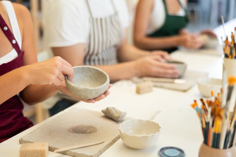 Female Hands Forming Plate from Wet Clay in Pottery Workshop Stock ...