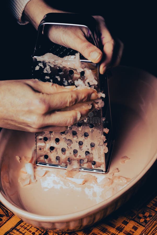 Female Hands Grate the Onion. Preparing Ingredients for Cooking Stock ...