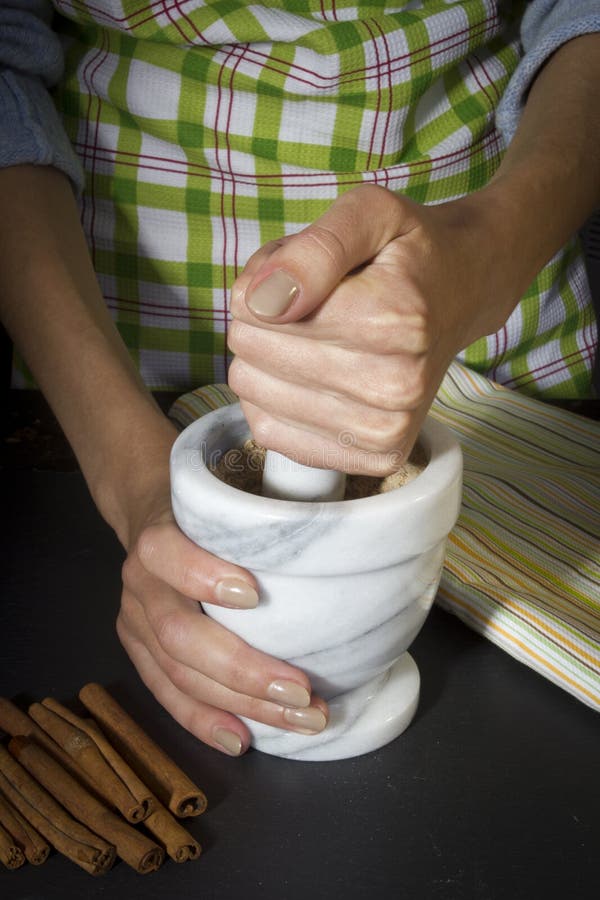 Hands Grind Cinnamon in a Mortar Stock Image - Image of flavor, seed ...