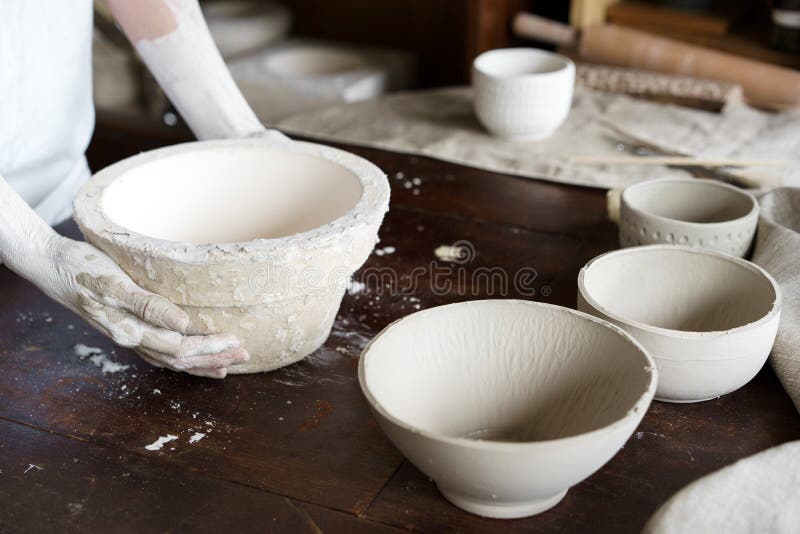 Female Hands Hold a Bowl for Casting Clay Products Stock Photo - Image ...