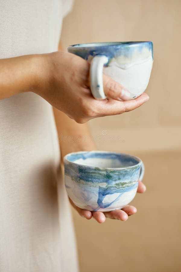 Female hands hold ceramic stock photo. Image of hands - 331991104