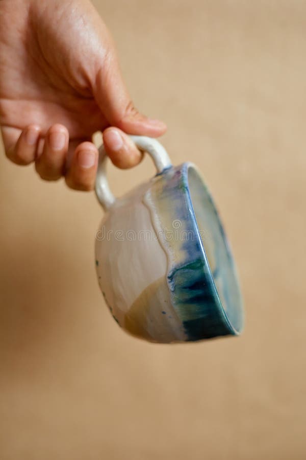 Female hands hold ceramic stock image. Image of beige - 331991175