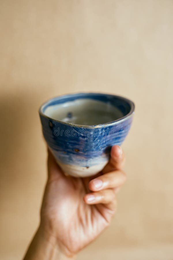 Female hands hold ceramic stock photo. Image of marketing - 331991250