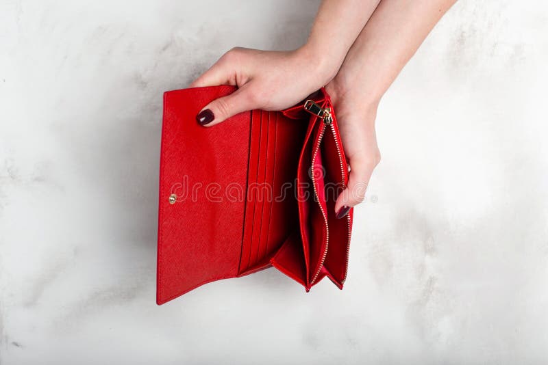 Female Hands Hold an Empty Stylish Red Purse on a White Granite Stock ...
