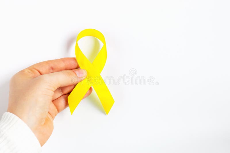 Female Hands Hold Yellow Ribbon on White Background Top View Stock ...