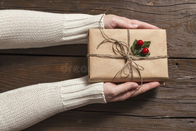 Female Hands Holding a Christmas Present Stock Photo - Image of detail ...