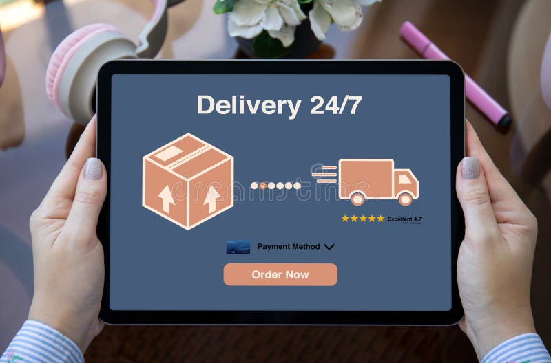 Female Hands Holding Computer Tablet with Parcel Delivery Application ...