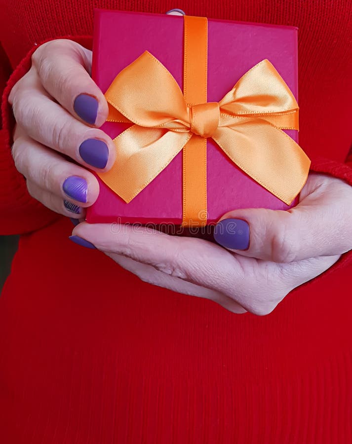 Female Hands Holding a Gift Box Decoration Stock Image - Image of ...