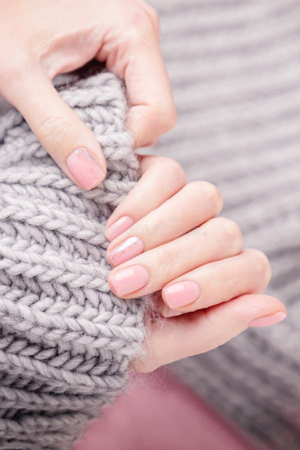 Female Hands Holding Large Gray Woolen Scarf. Top View Stock Photo ...