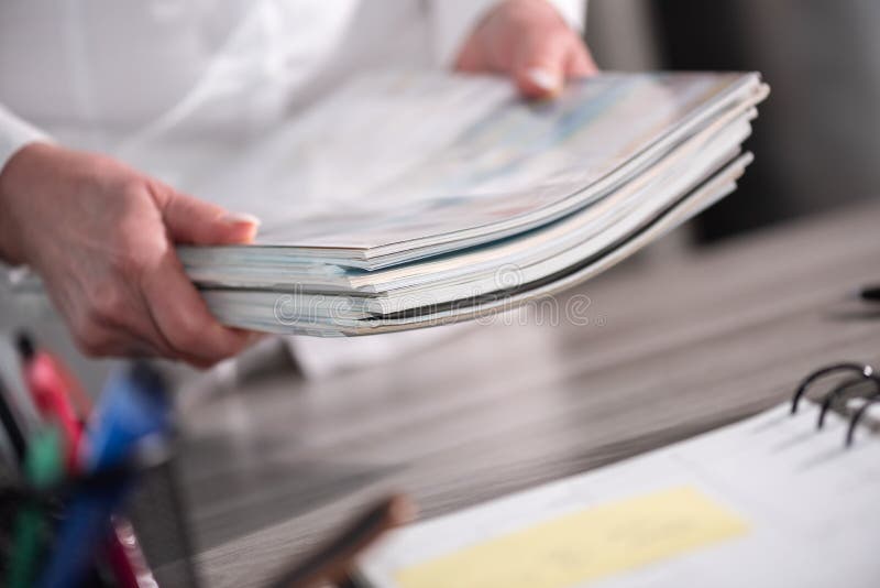 Female Hands Holding Magazines Stock Photo - Image of fashion, media ...