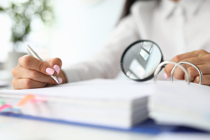 Female Hands Holding Magnifying Glass Over Folder with Documents ...