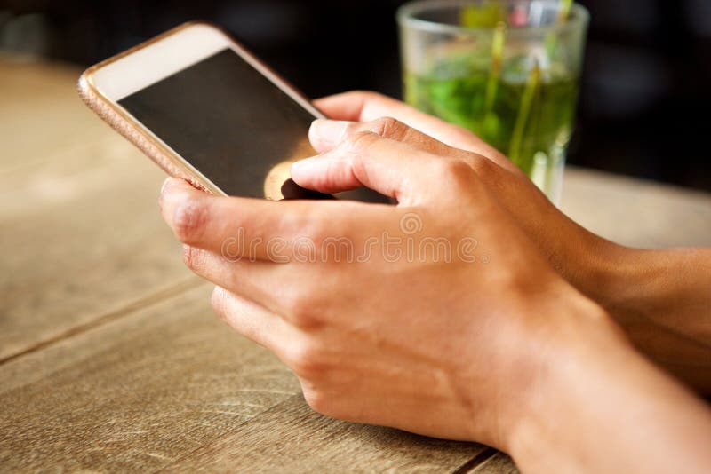 Female Hands Holding Mobile Phone at Table with Drink Stock Image ...