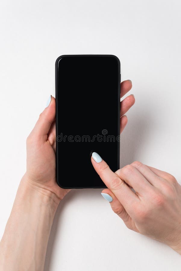Female Hands Holding Phone and Point Your Finger at the Screen. Black ...