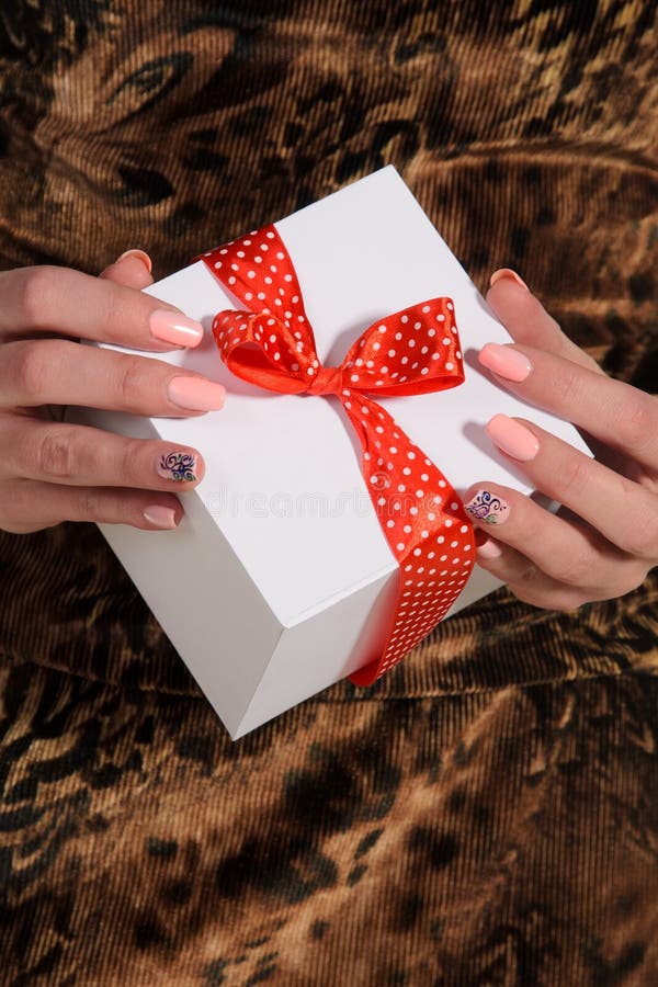 Female Hands Holding Present Stock Image - Image of female, birthday ...